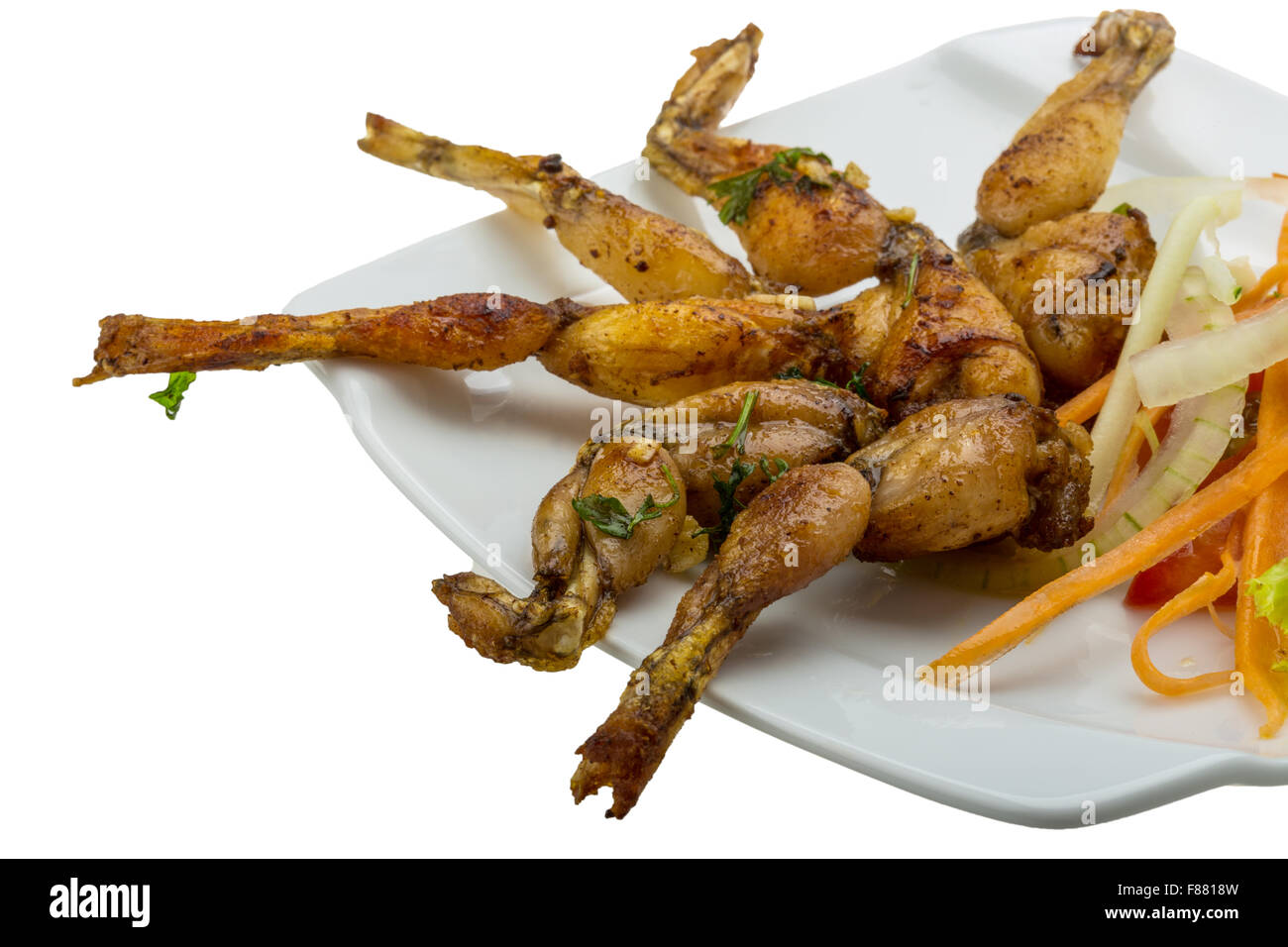 Grilled frog legs - French style Stock Photo - Alamy