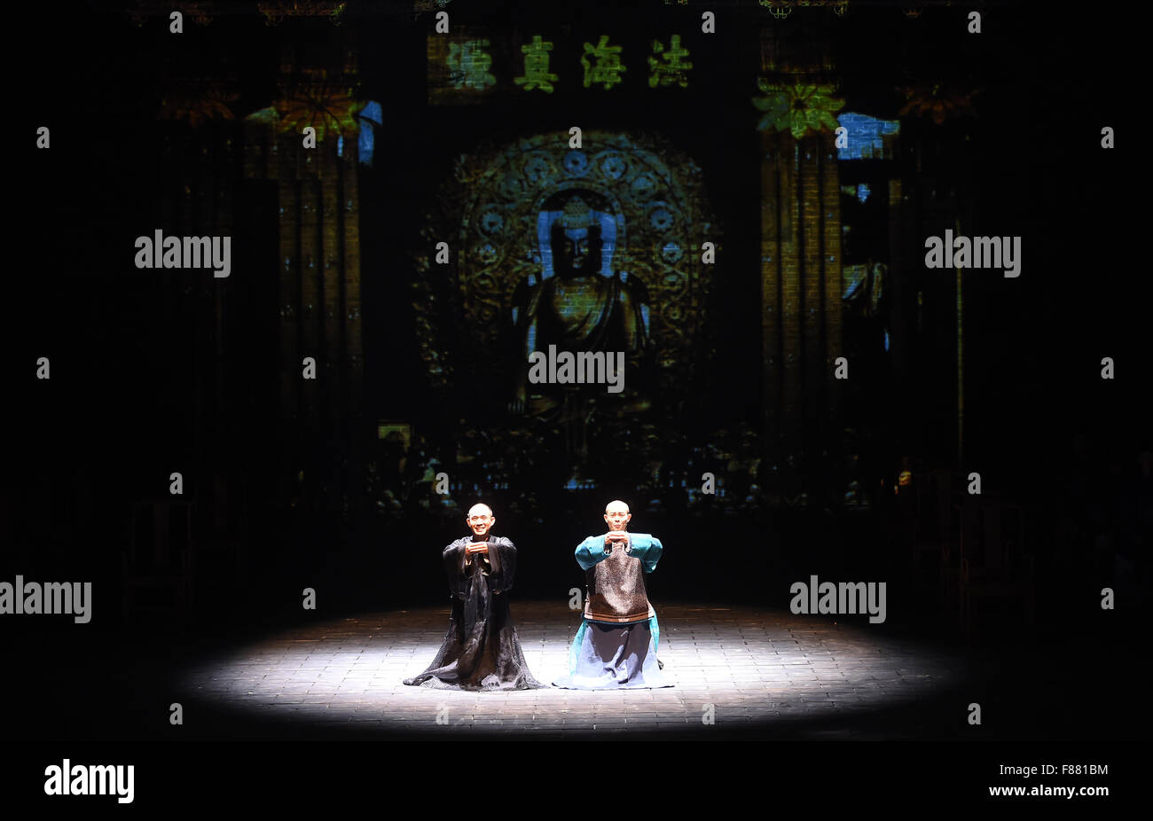 Beijing, China. 6th Dec, 2015. Actor Jia Yiping (L), who plays the role ...