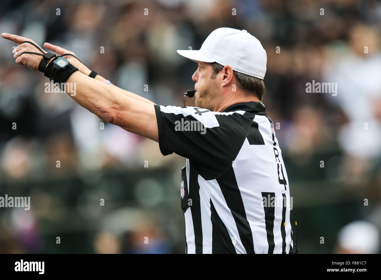 Oakland, California, USA. 6th Dec, 2015. Referee Craig Wrolstad (4) in ...