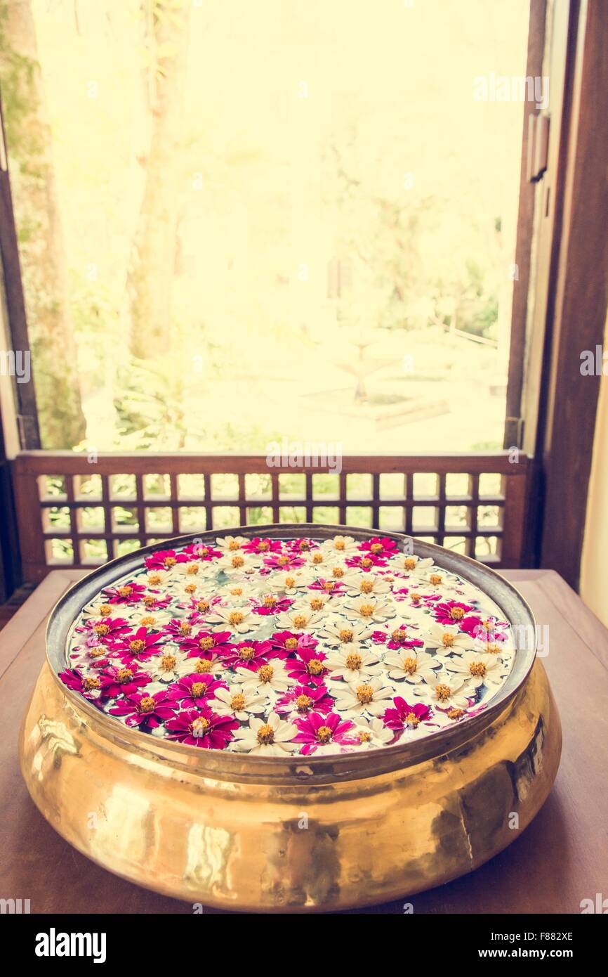 Flowers floating in water Stock Photo - Alamy