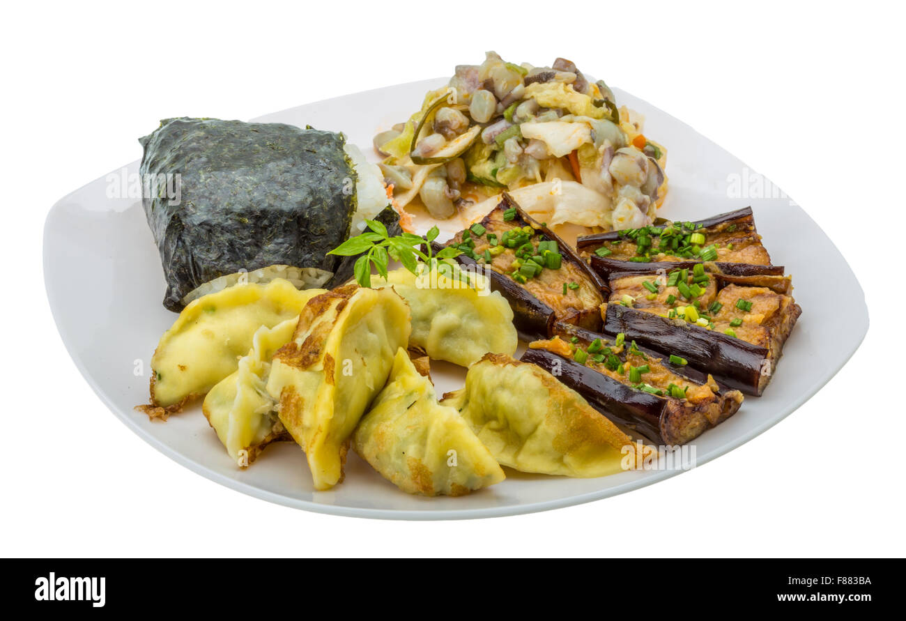 Japan traditional food - rice ball, gyoza, eggplant and octopus salad ...