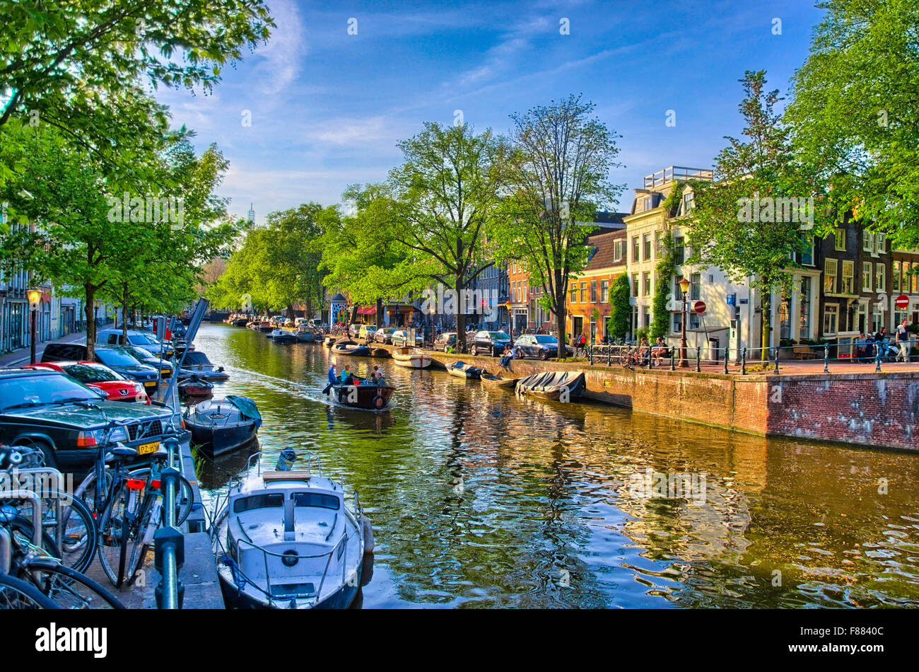 Boats on Amstel river in Amsterdam, Holland, Netherlands, HDR Stock ...