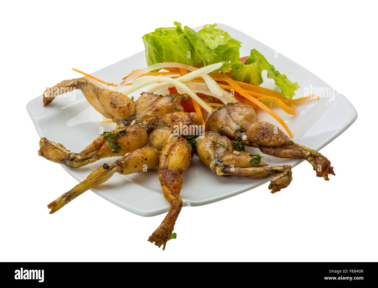 Grilled frog legs - French style Stock Photo - Alamy