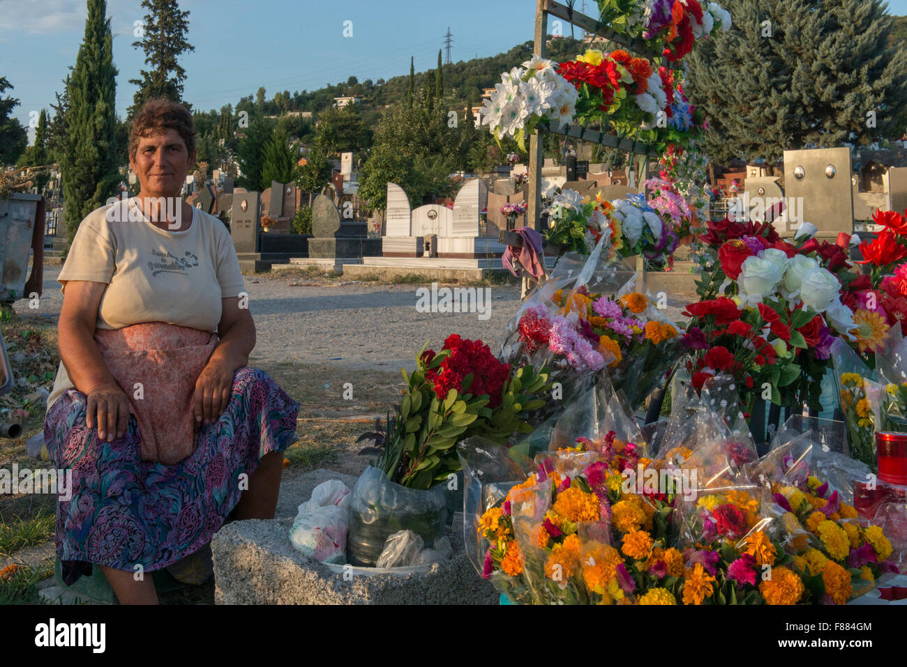 Lady Selling Flowers, Varreza e Sharrës Cemetery, Tirana Stock Photo ...