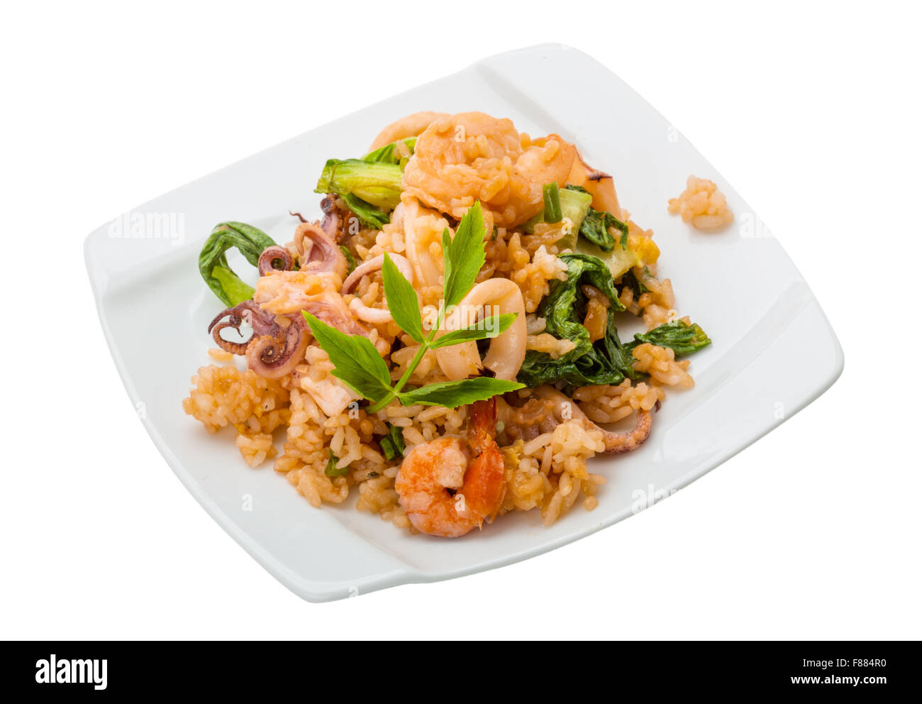 Rice with seafood isolated on white Stock Photo - Alamy