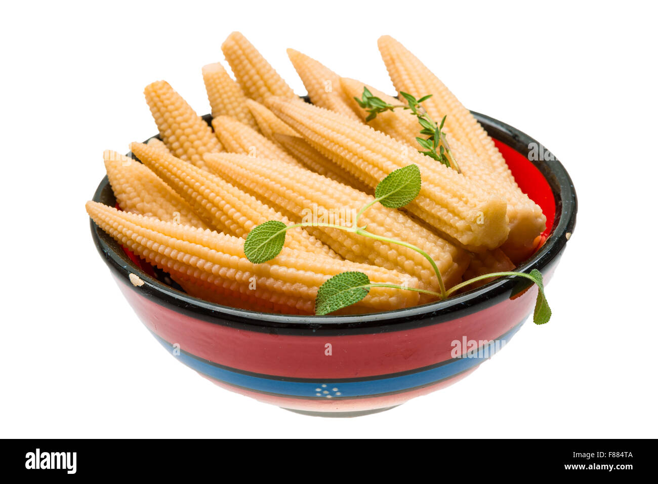 Baby corn with thyme Stock Photo - Alamy