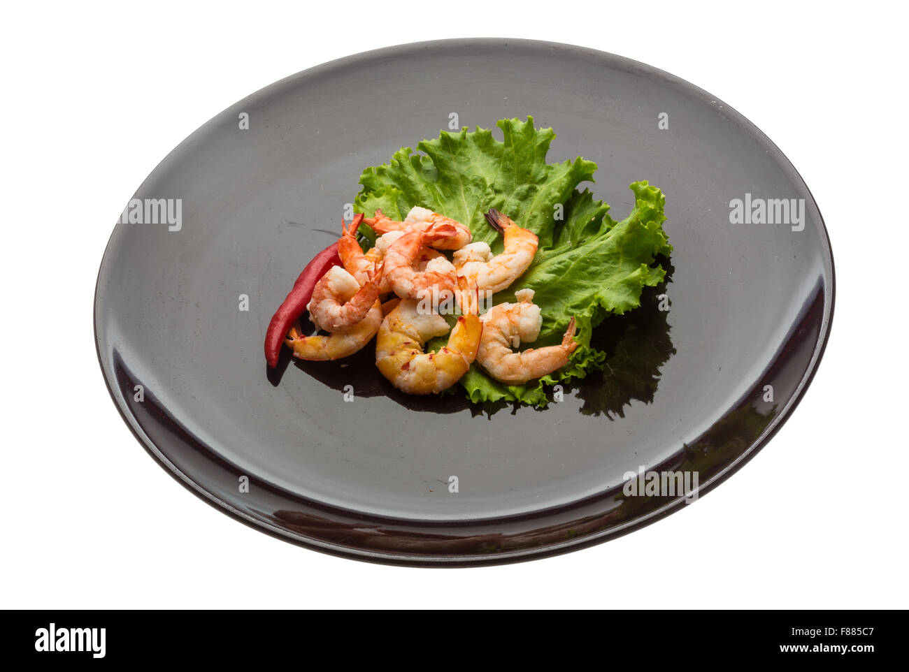 Unshelled king prawn heap with salad leaves Stock Photo - Alamy