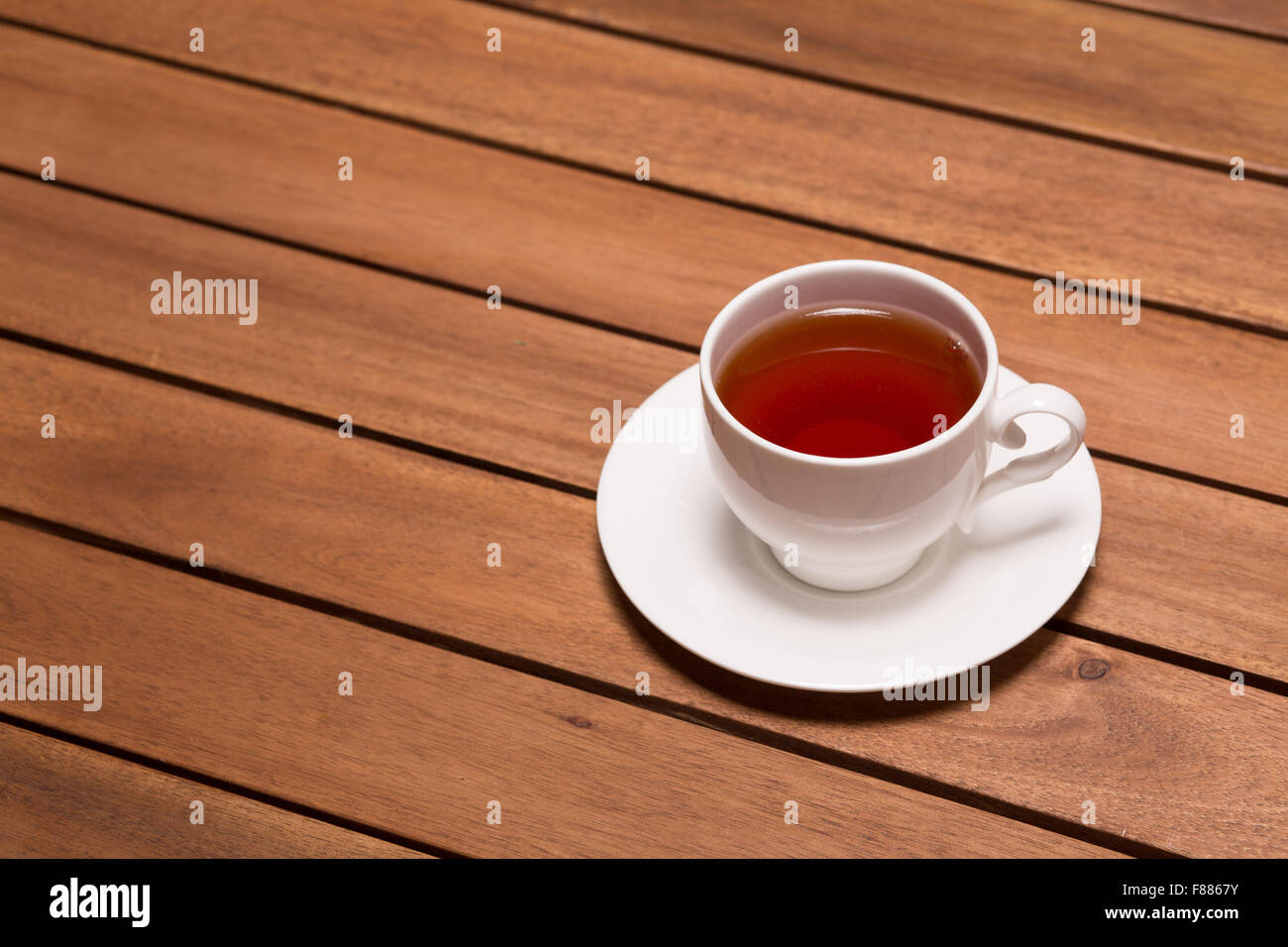A cup of tea on the wooden table Stock Photo - Alamy