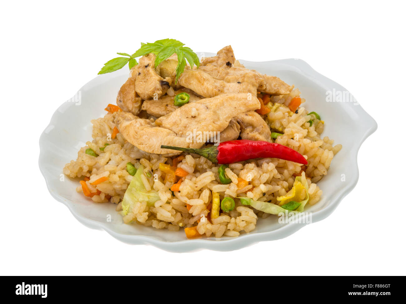Fried rice with chicken - traditional asian food Stock Photo - Alamy
