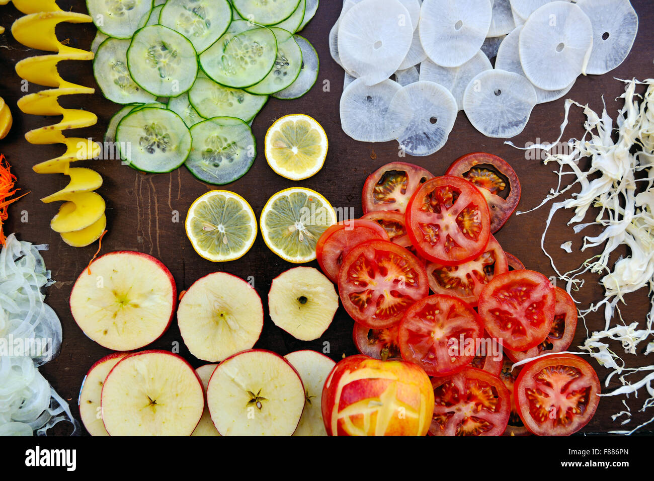 fresh healthy organic food mixed vegetables slice on black background ...