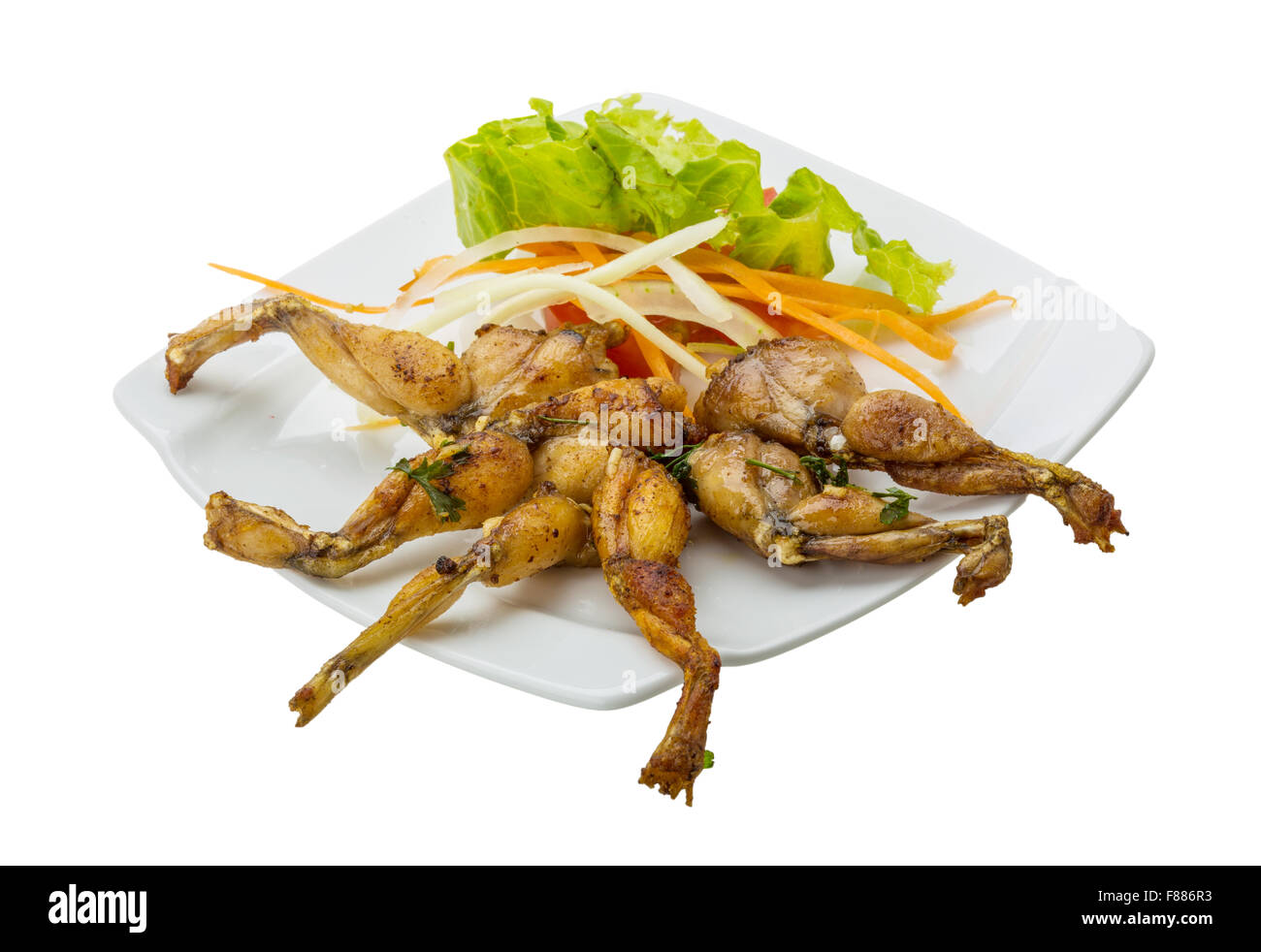Grilled frog legs - French style Stock Photo - Alamy