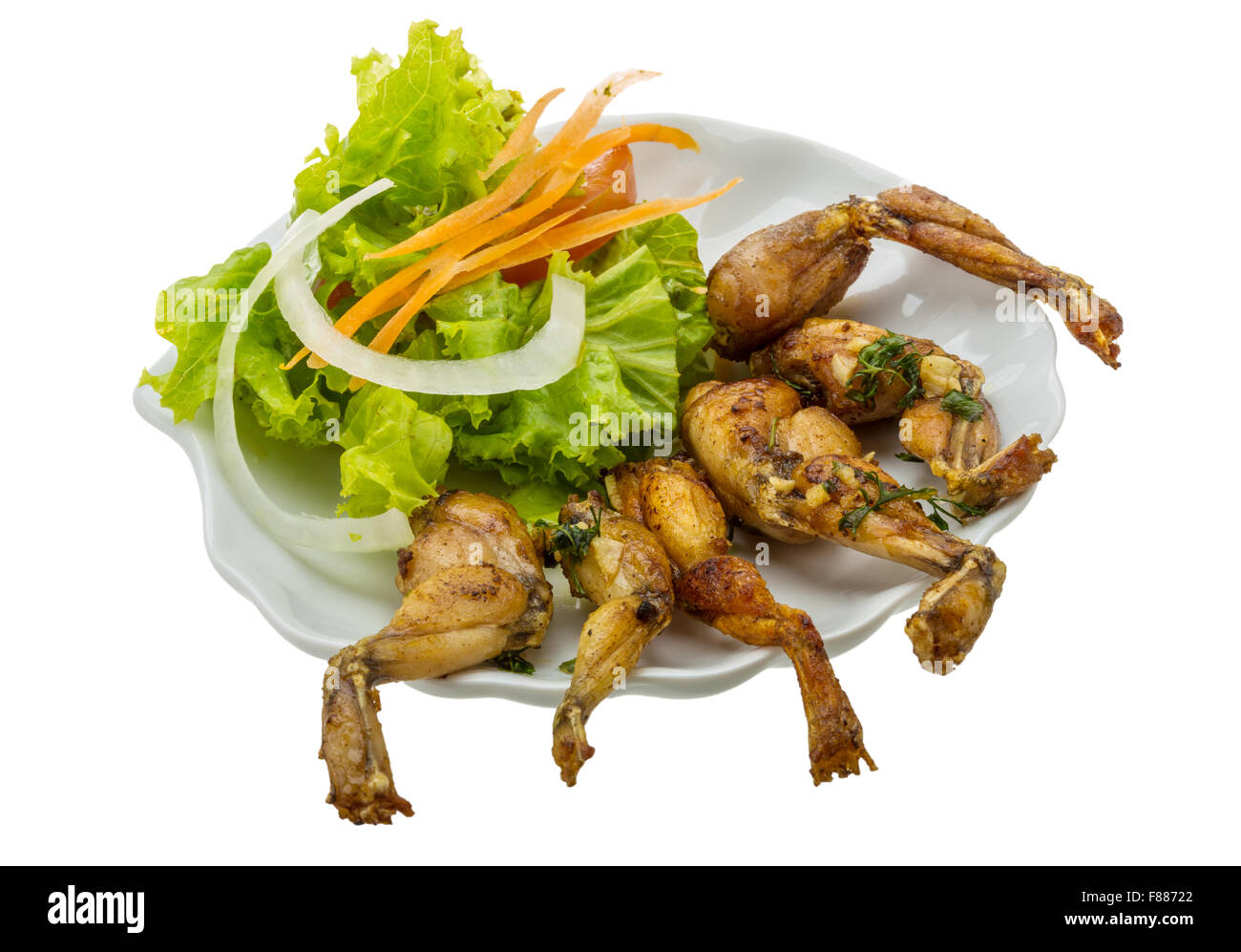 Grilled frog legs - French style Stock Photo - Alamy