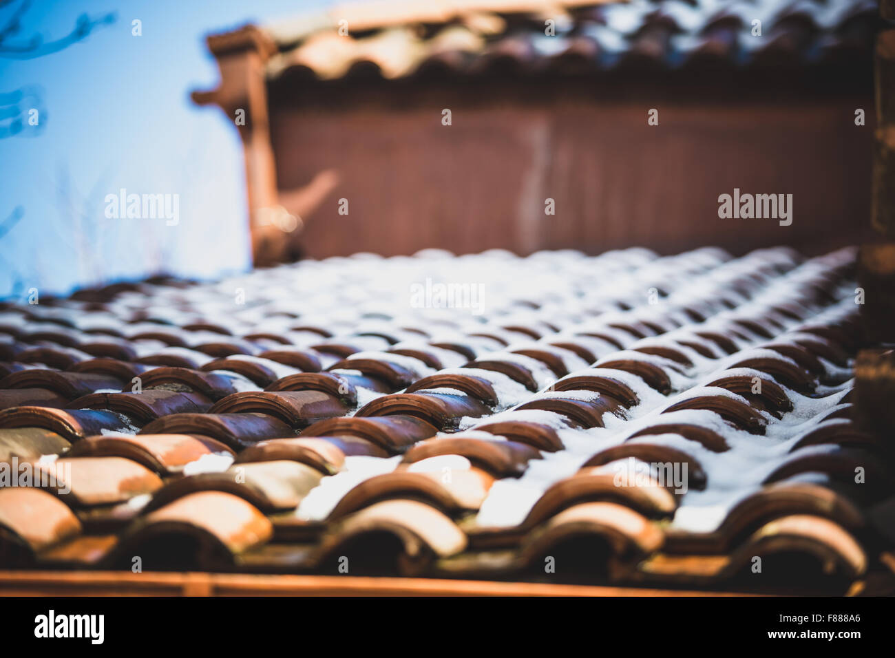 snow on red tiled roof Stock Photo - Alamy