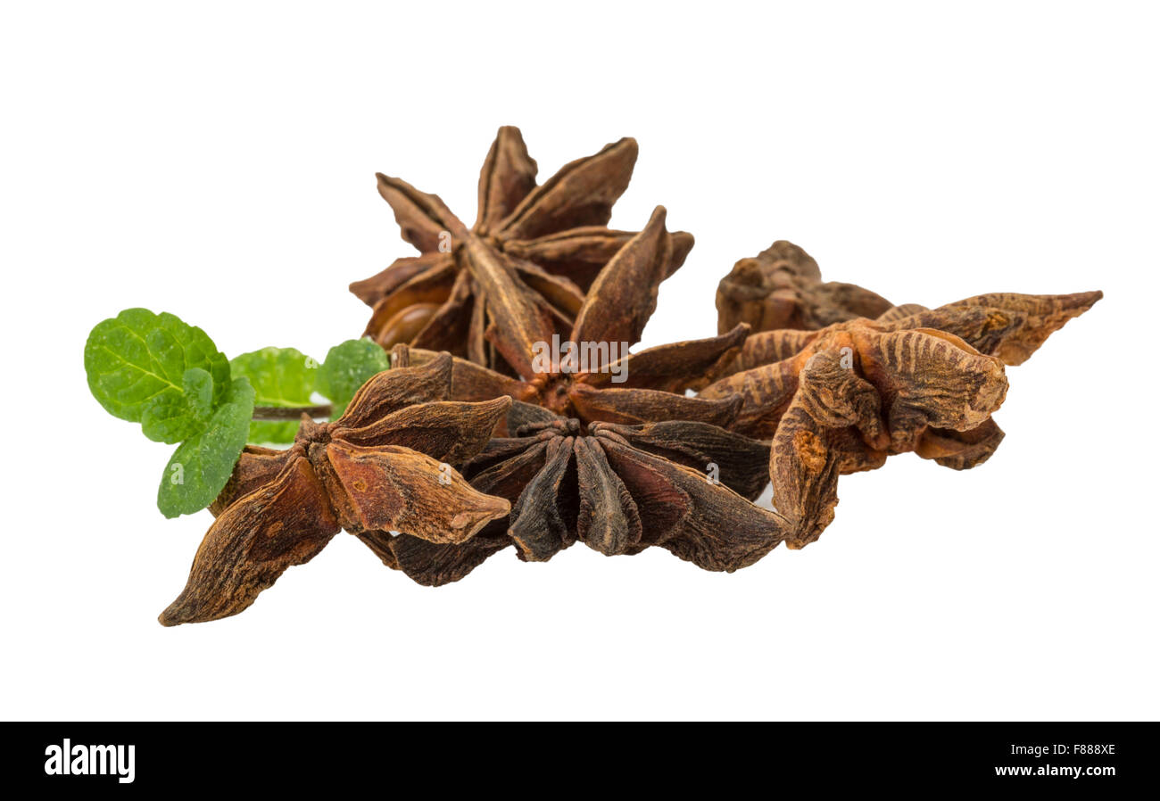 Star-anise heap isolated on white Stock Photo - Alamy