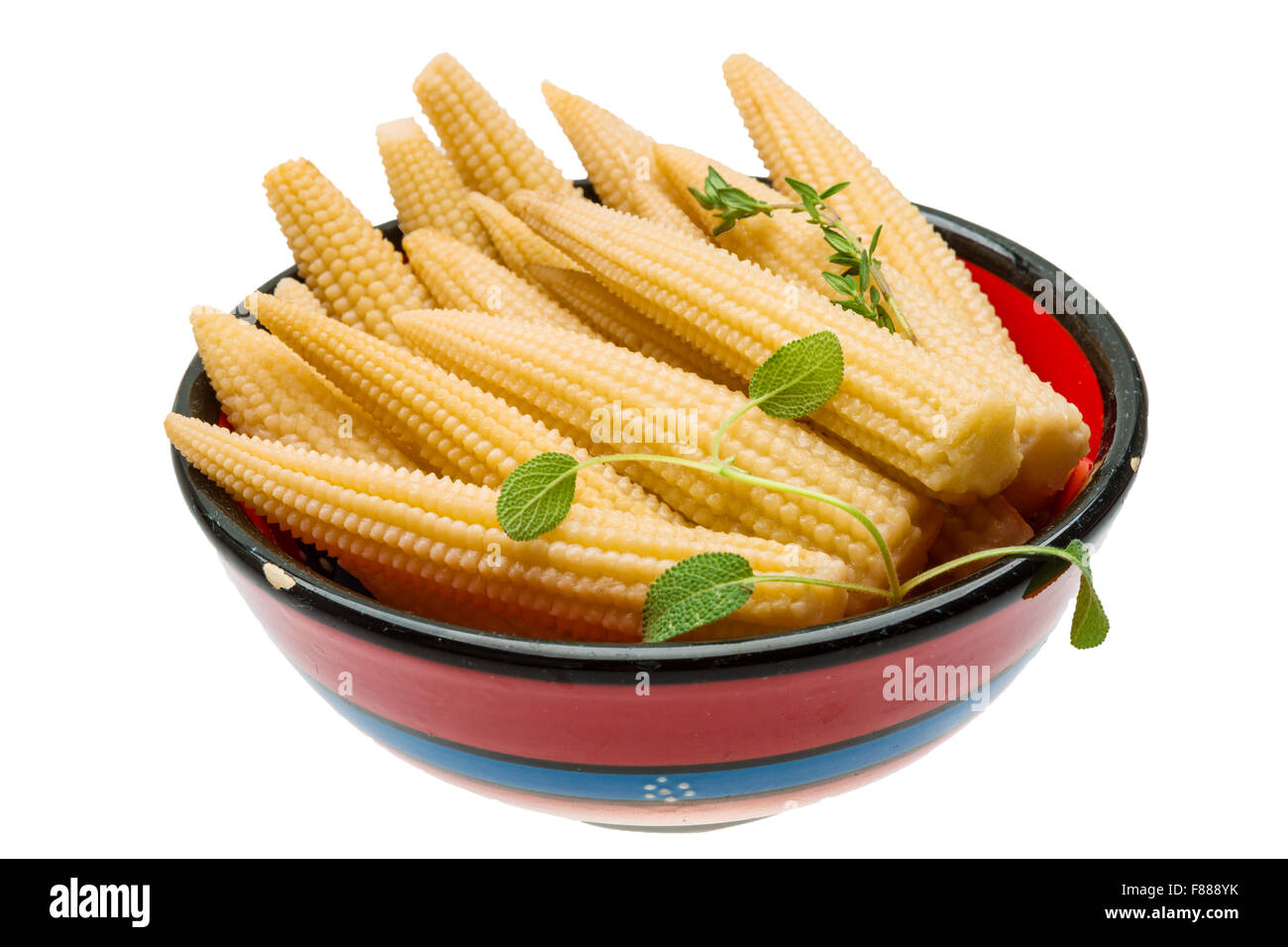 Baby corn with thyme Stock Photo - Alamy