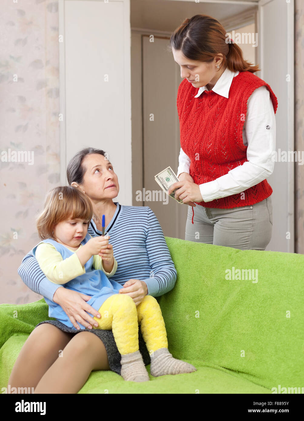 Woman female pays dollars hi-res stock photography and images - Alamy