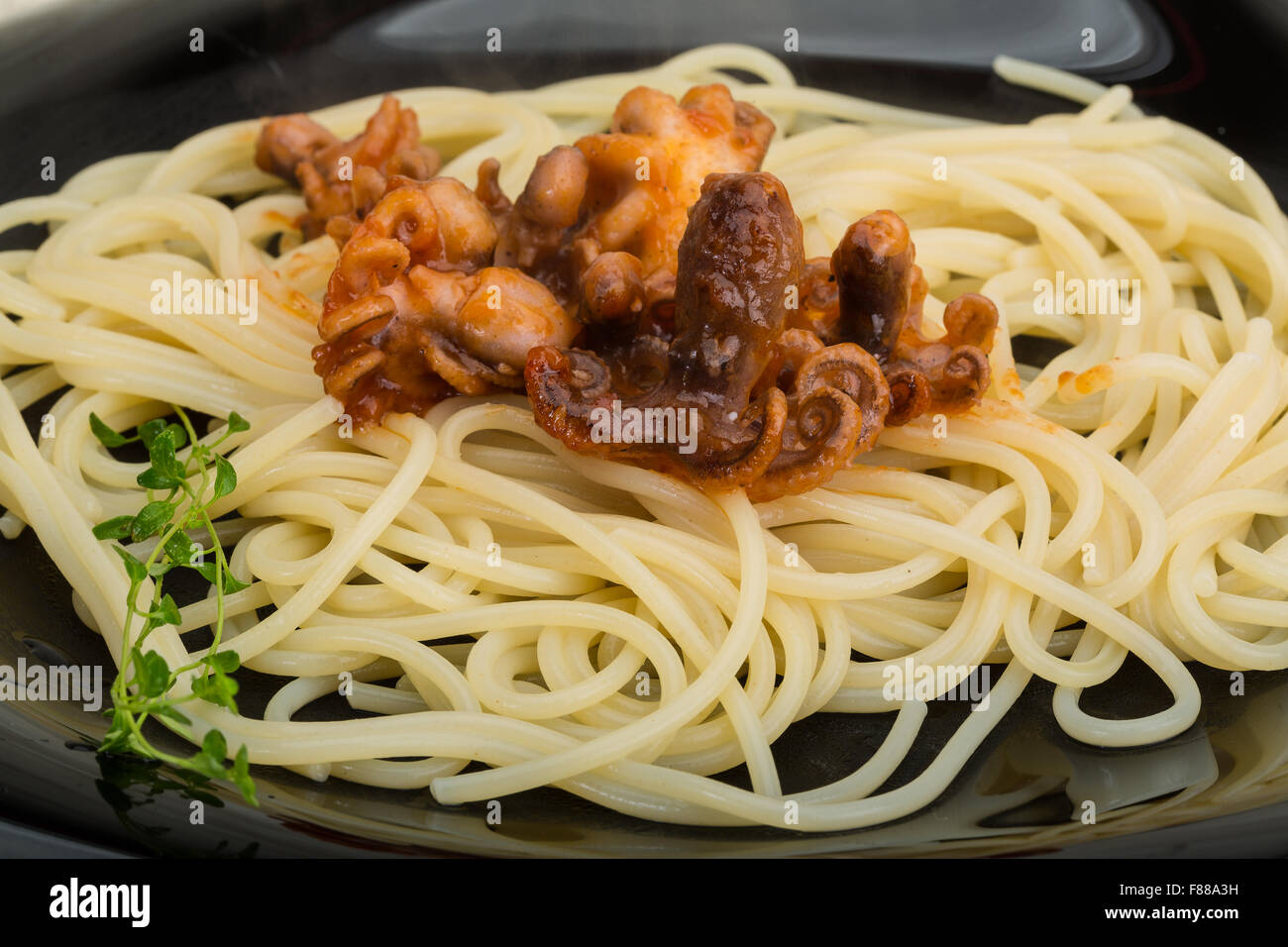 Pasta with octopus - italian spaghetti marinara Stock Photo - Alamy