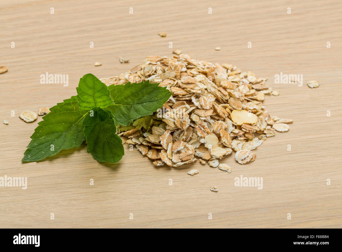 Raw oats on the board Stock Photo - Alamy