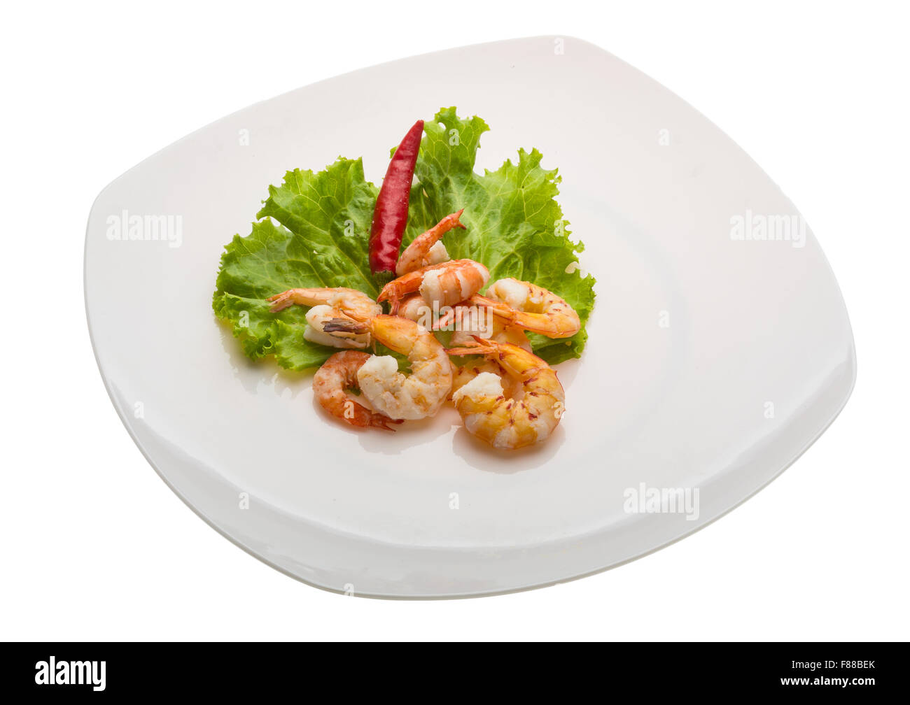 Unshelled king prawn heap with salad leaves Stock Photo - Alamy