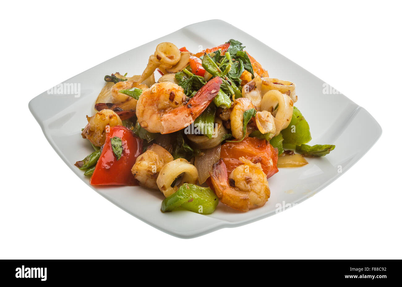 Seafood with vegetables - shrimps and calamari Stock Photo - Alamy