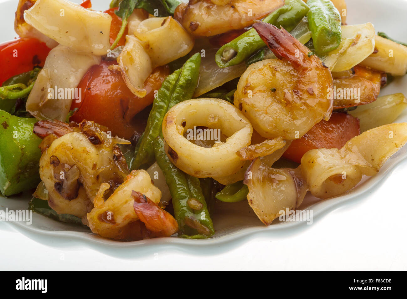 Seafood with vegetables - shrimps and calamari Stock Photo - Alamy