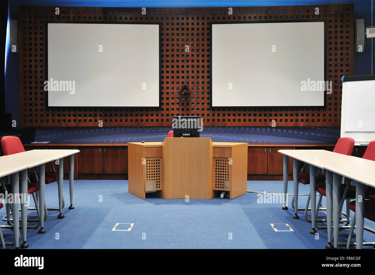 video conference room with chairs and big board projector canvas and ...