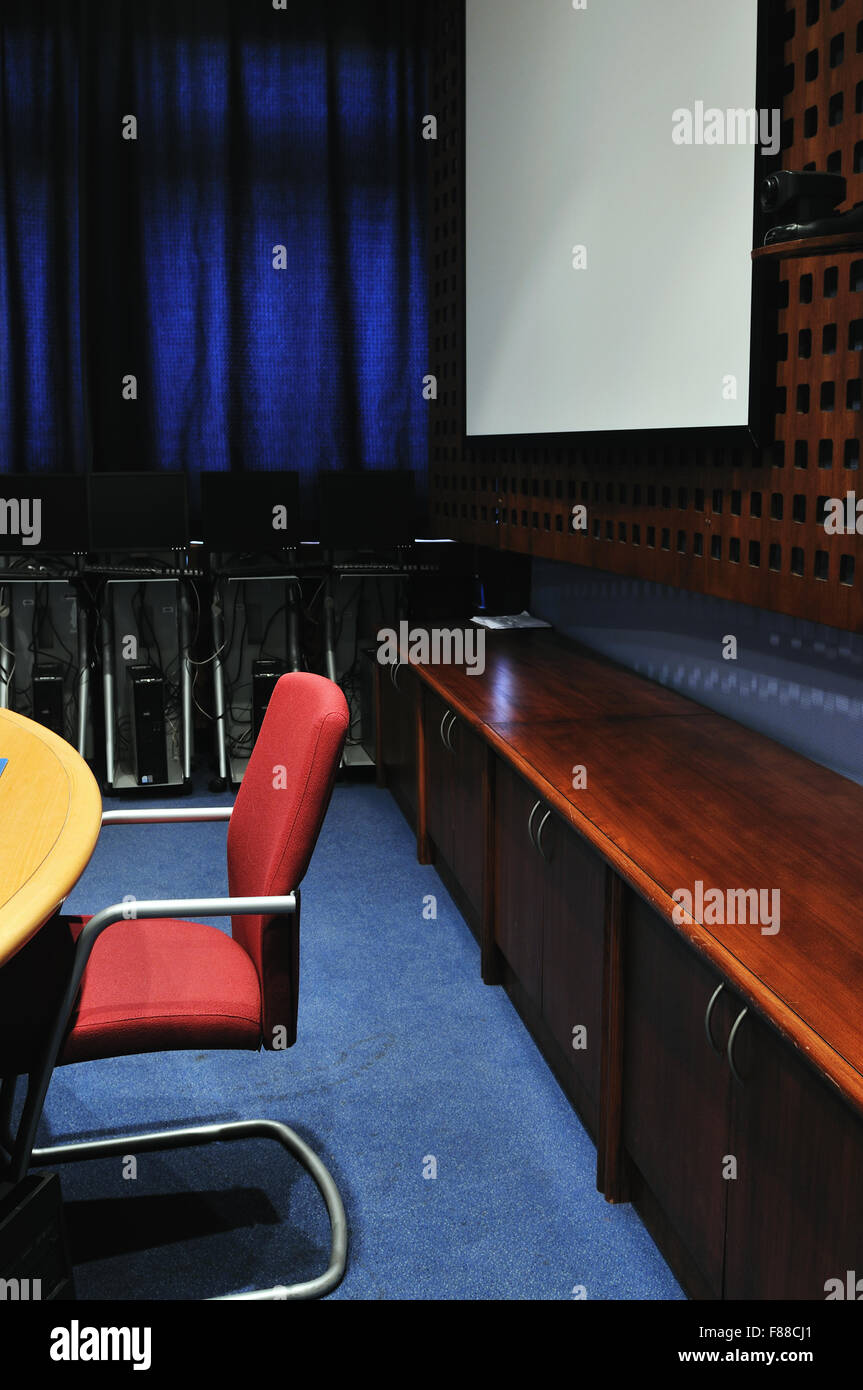 video conference room with chairs and big board projector canvas and ...