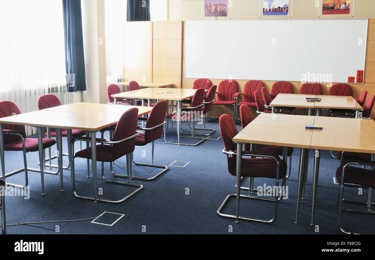 video conference room with chairs and big board projector canvas and ...