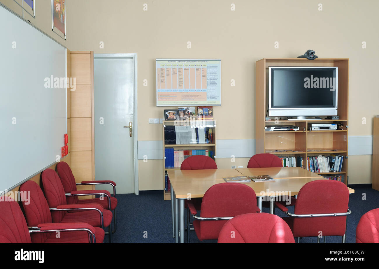 video conference room with chairs and big board projector canvas and ...