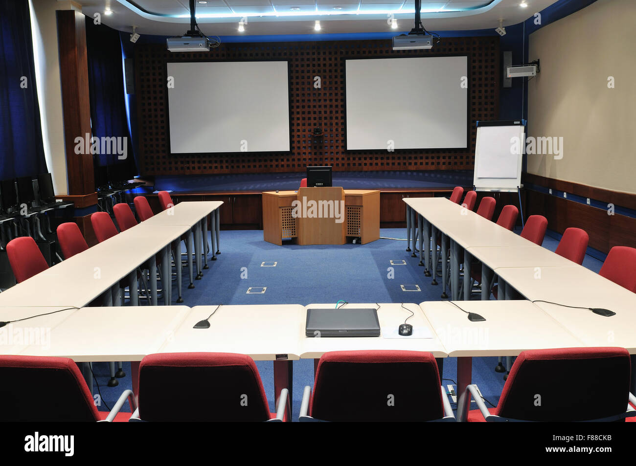 video conference room with chairs and big board projector canvas and ...