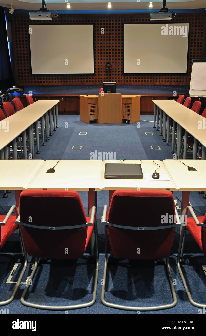 video conference room with chairs and big board projector canvas and ...