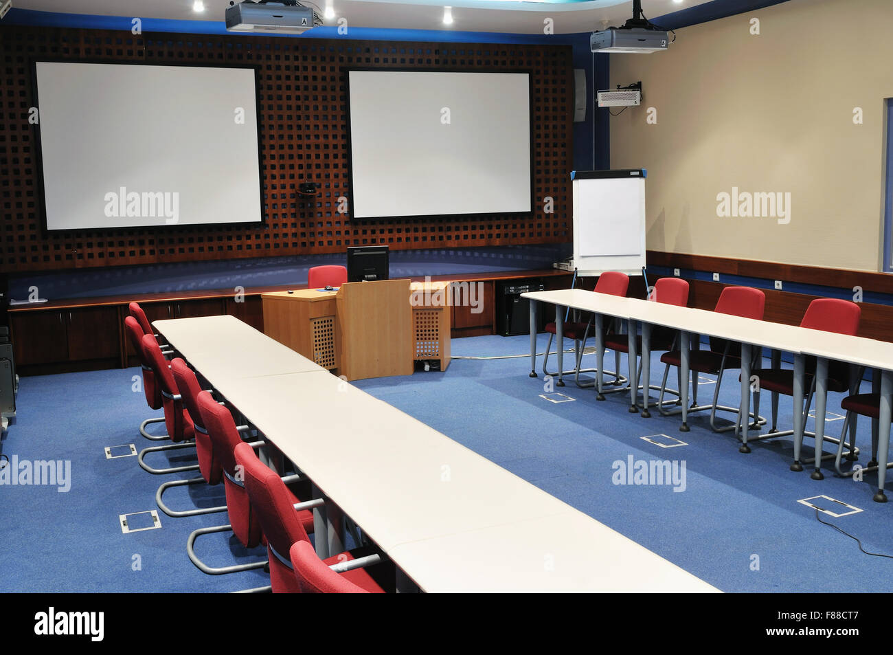 video conference room with chairs and big board projector canvas and ...