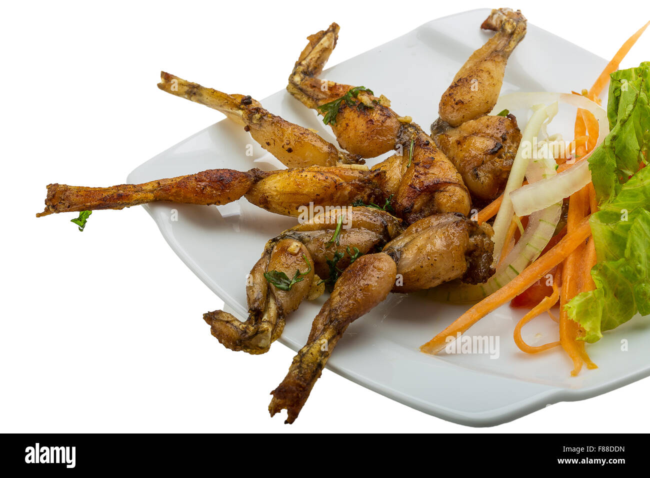 Grilled frog legs - French style Stock Photo - Alamy