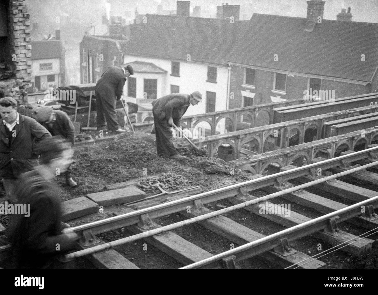 Workmen on the old railway bridge at Shifnal, Shropshire, 1953 Stock ...