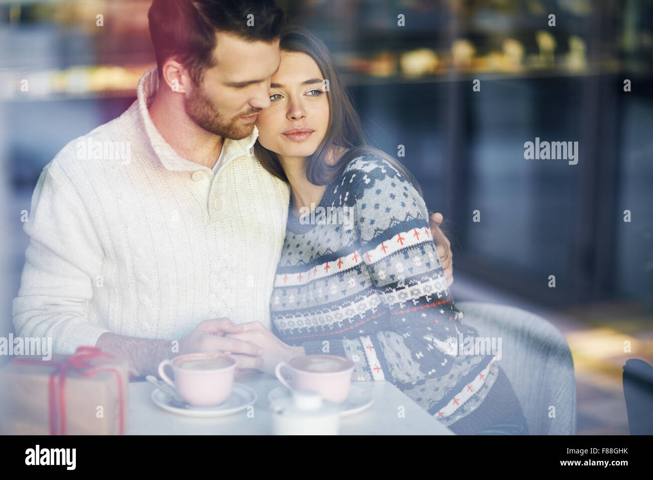 Romantic couple having rest in cafe Stock Photo - Alamy