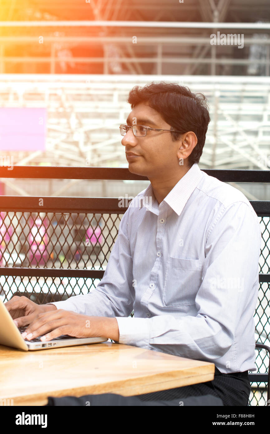 indian having coffee with computer Stock Photo - Alamy