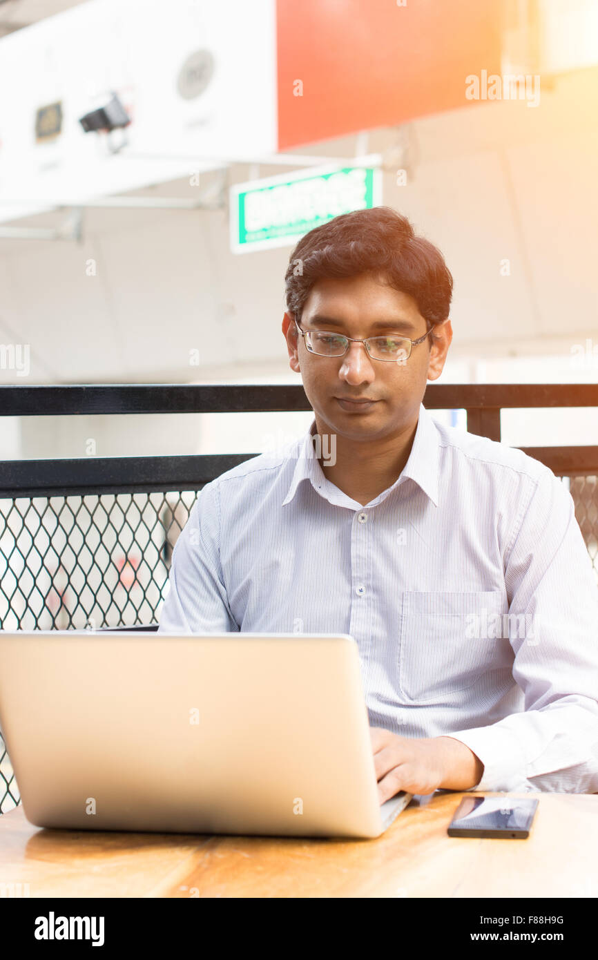 indian having coffee with computer Stock Photo - Alamy