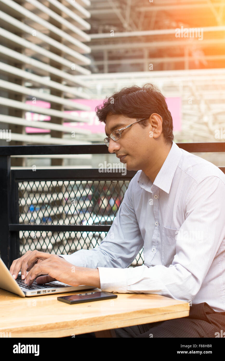 indian having coffee with computer Stock Photo - Alamy
