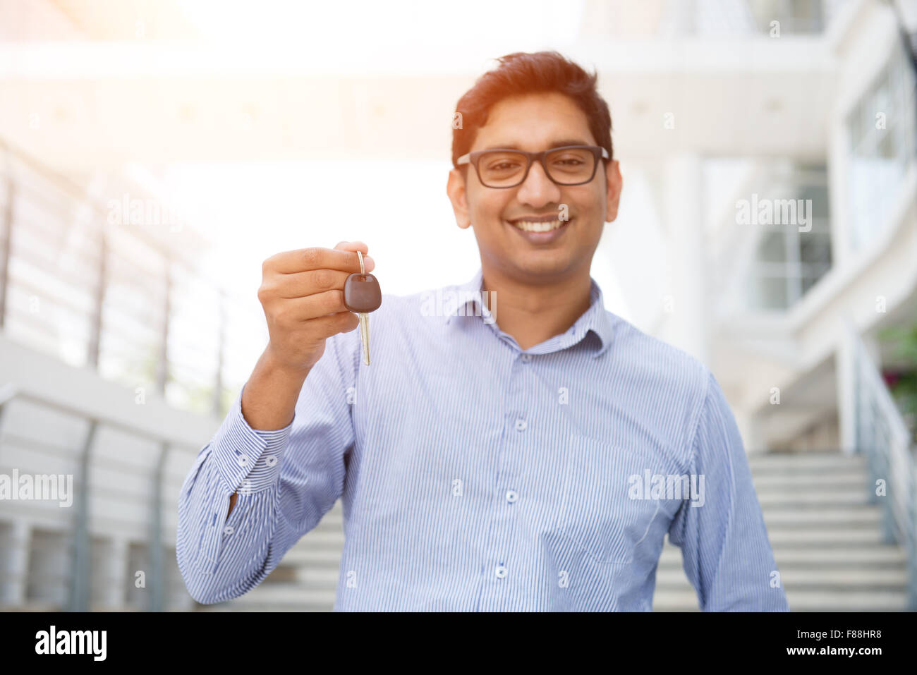 indian male with car keys Stock Photo - Alamy