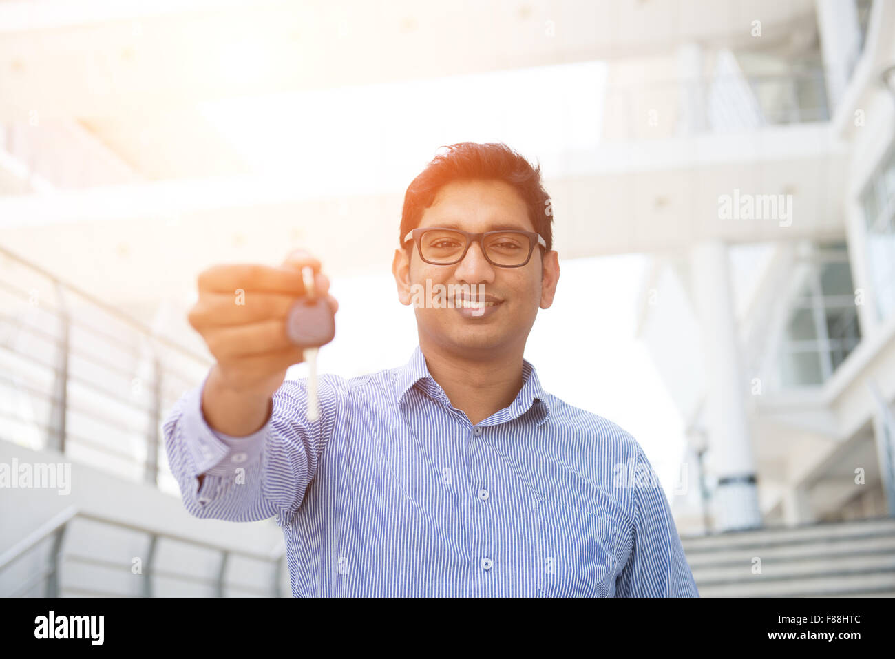 indian male with car keys Stock Photo - Alamy