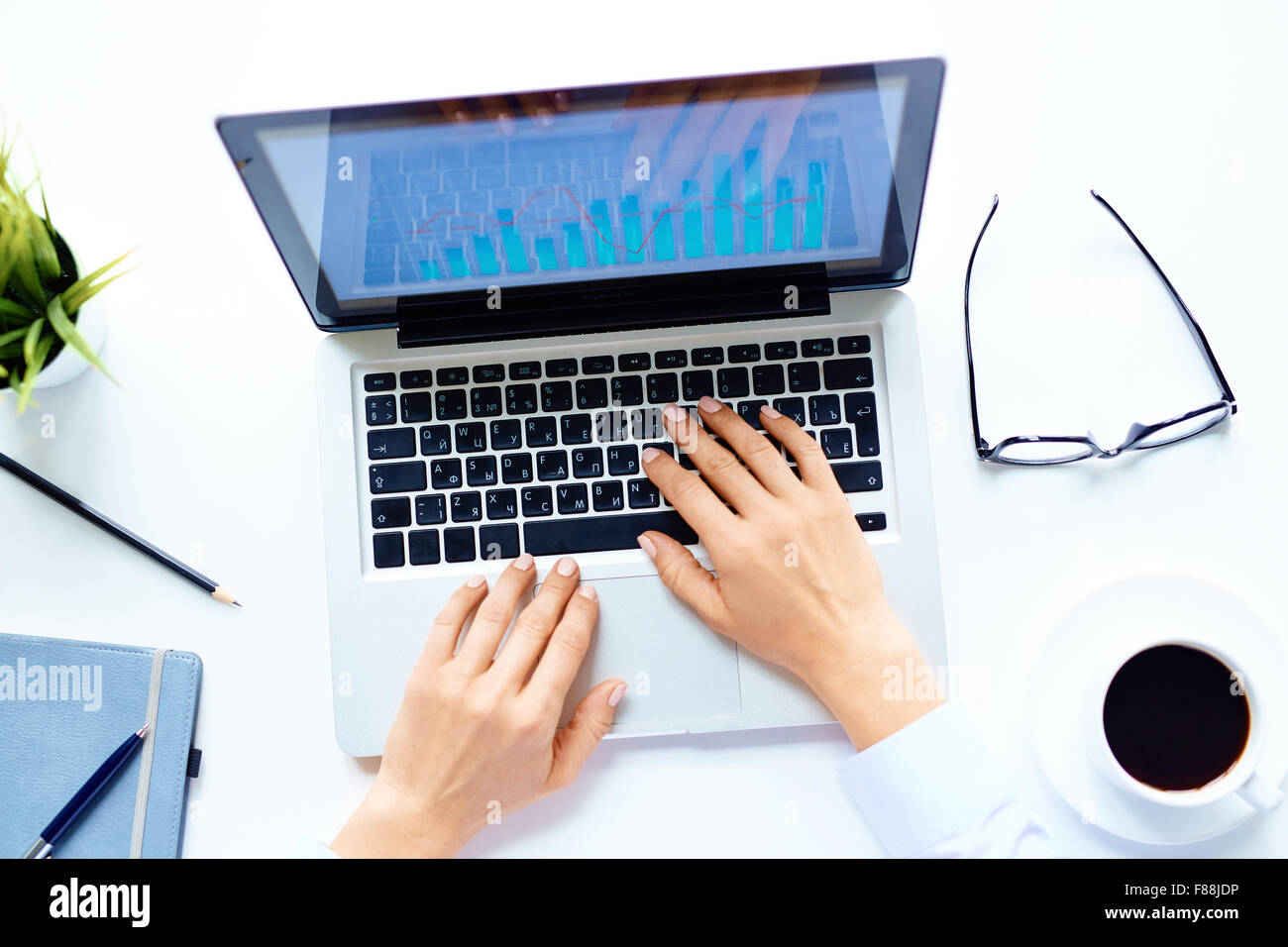 Human hands typing on laptop Stock Photo - Alamy