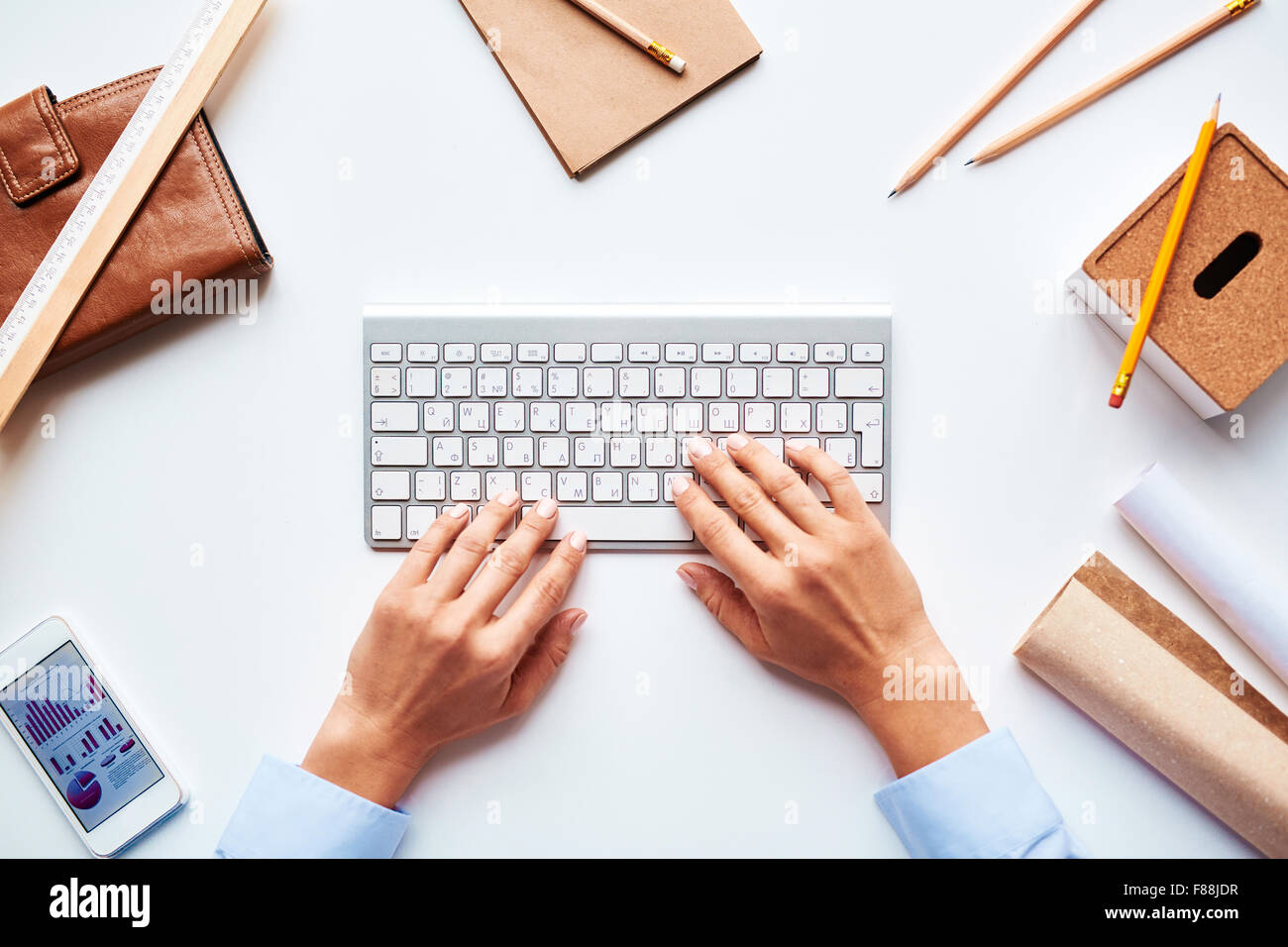 Human hands typing at workplace Stock Photo - Alamy