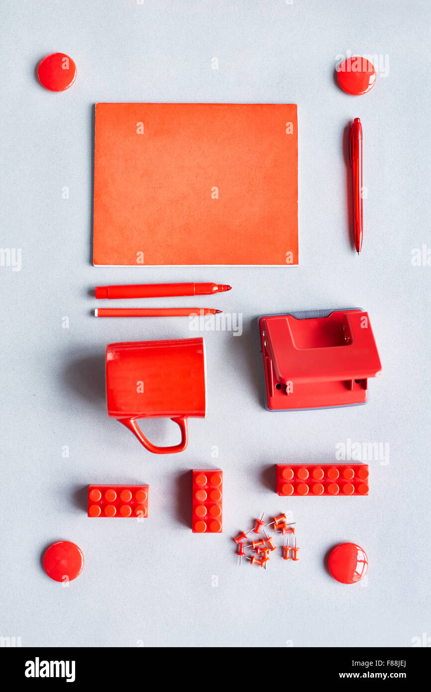Group of red office supplies Stock Photo - Alamy