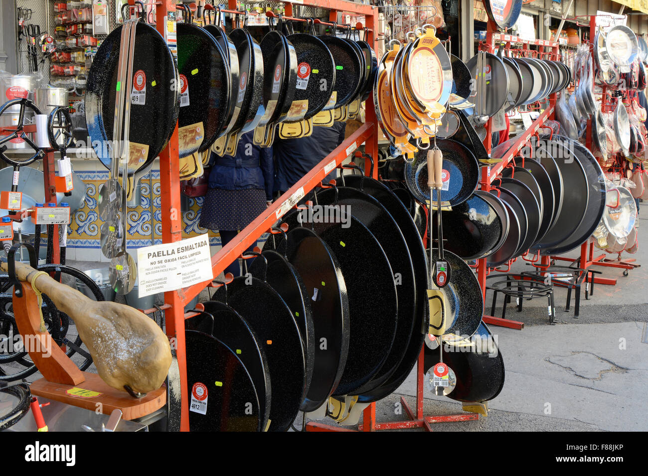 Hardware and cookware shop with outdoor display of pots and paella pans ...