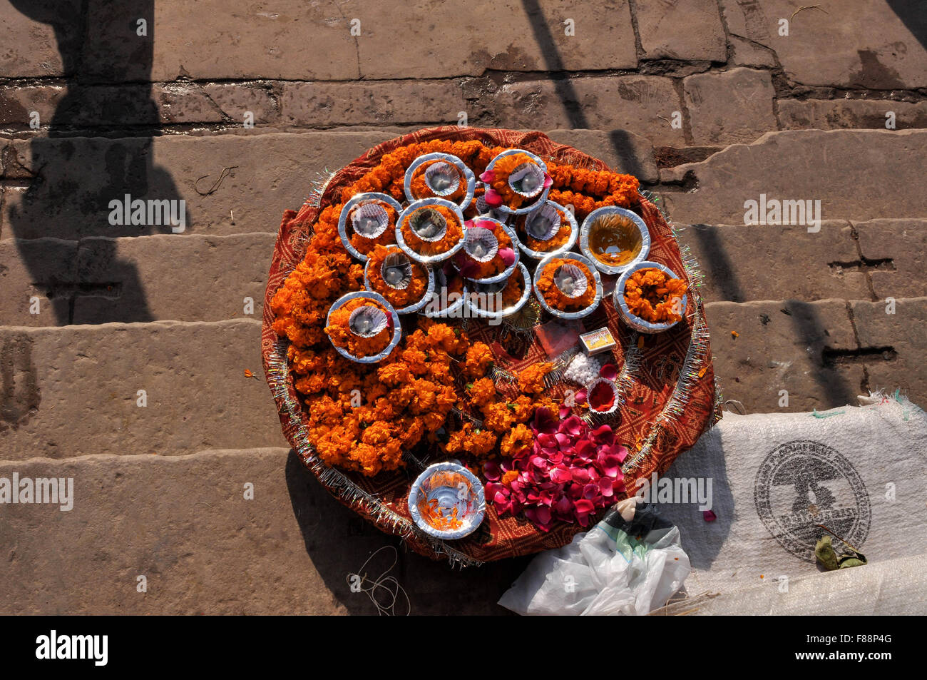 Red rose holy offerings devotee hi-res stock photography and images - Alamy