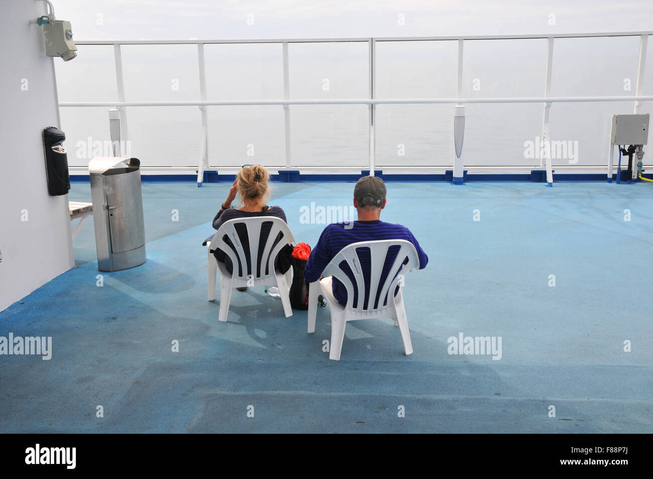 Couple deck chairs hi-res stock photography and images - Alamy