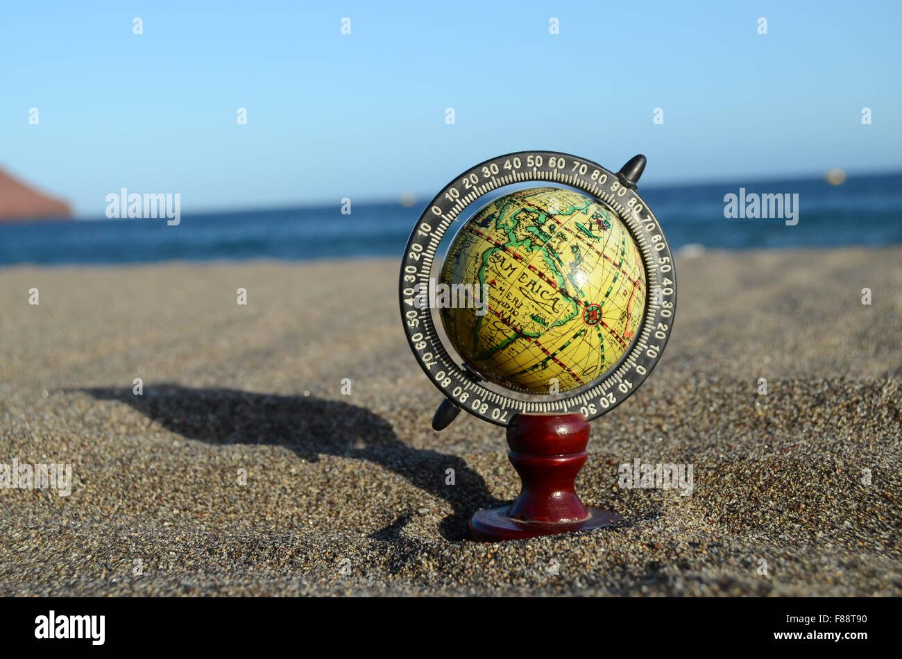 Globe Earth on the Beach Stock Photo - Alamy