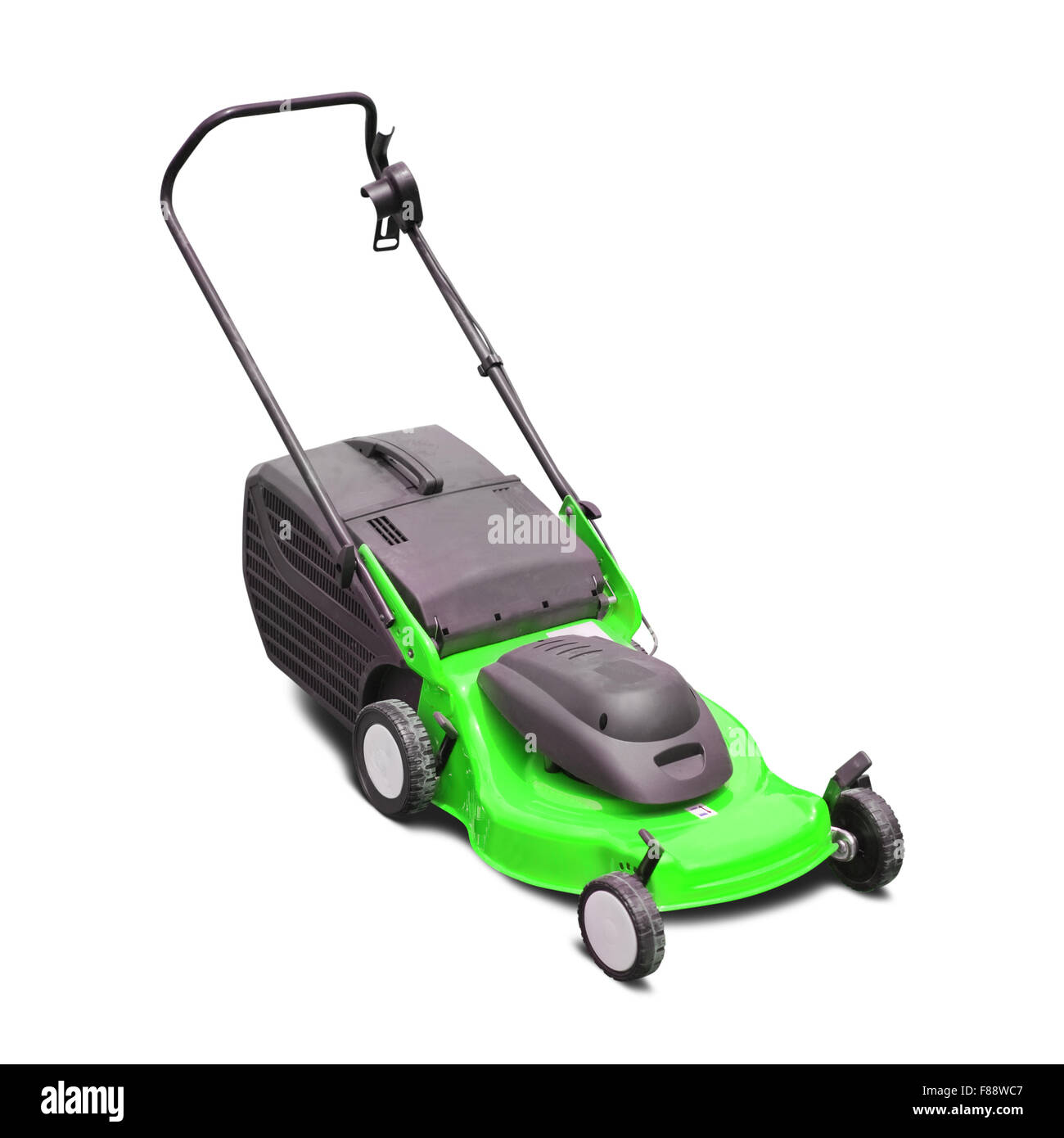 Green lawn mower. Isolated with clipping path Stock Photo - Alamy