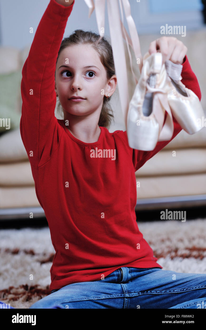 ballet girl exercise and learn at home Stock Photo - Alamy
