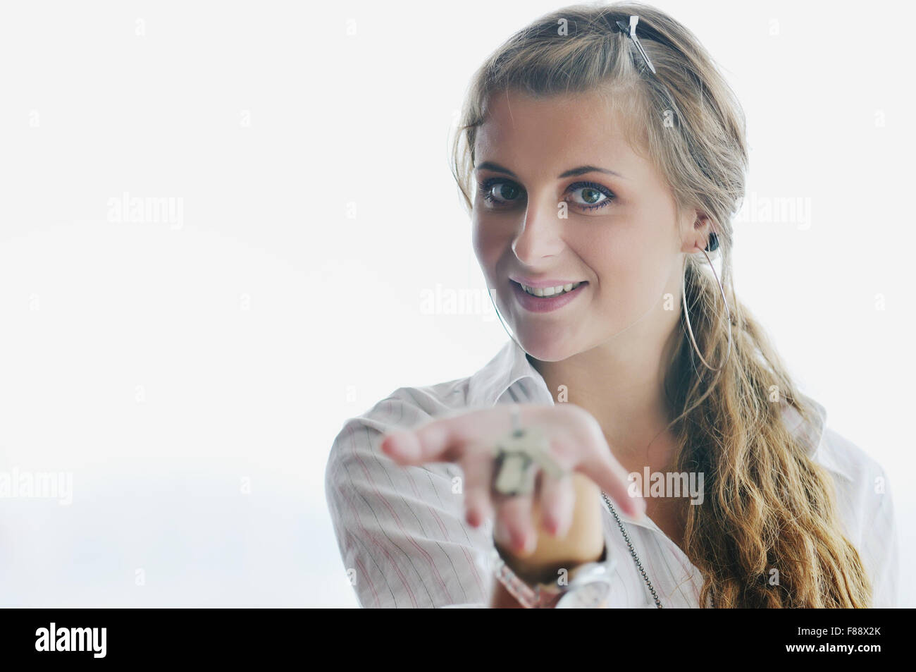 happy young woman throw keys from their apartment and home in ai and ...